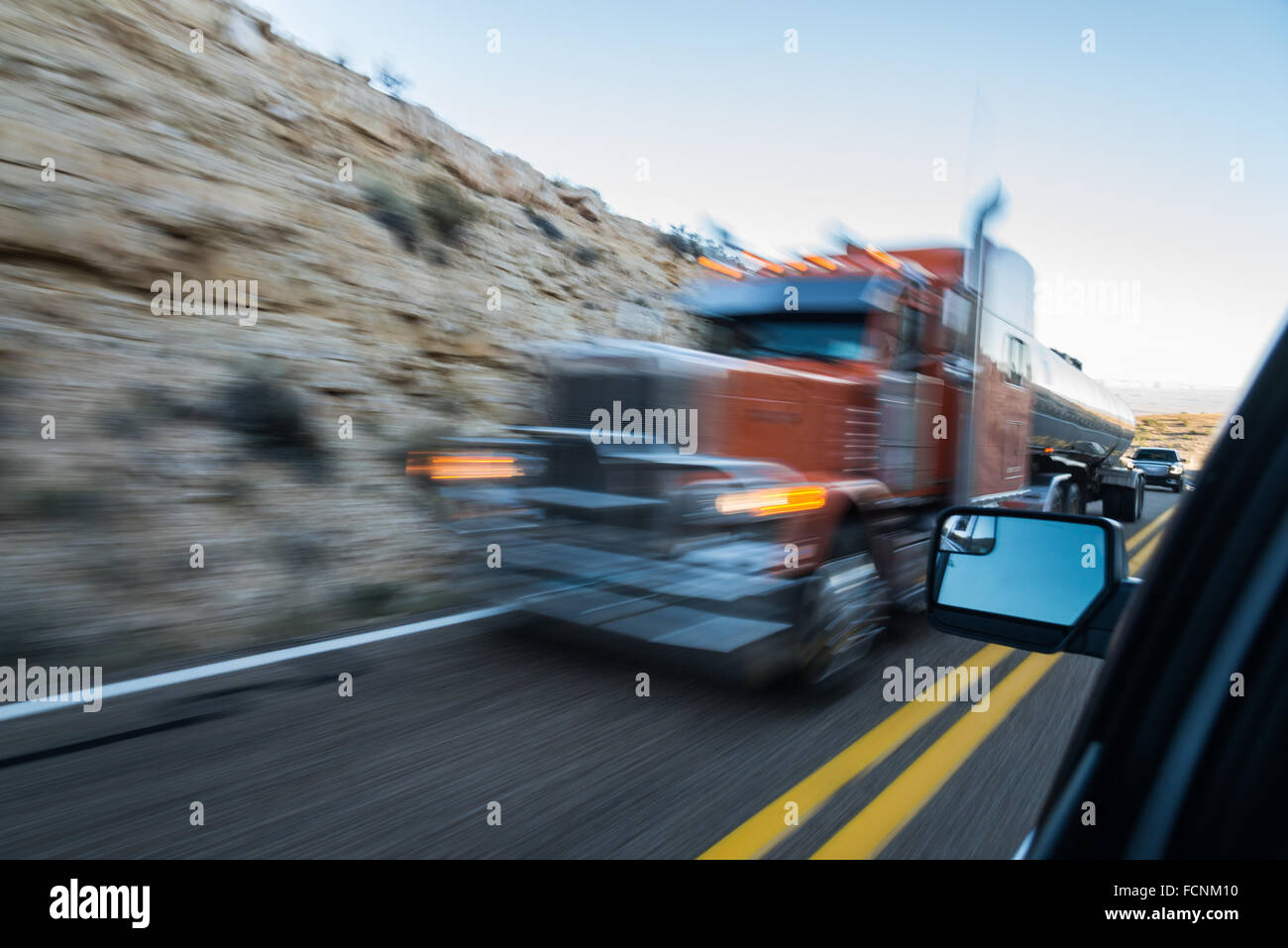 Blured truck through window of car Stock Photo - Alamy