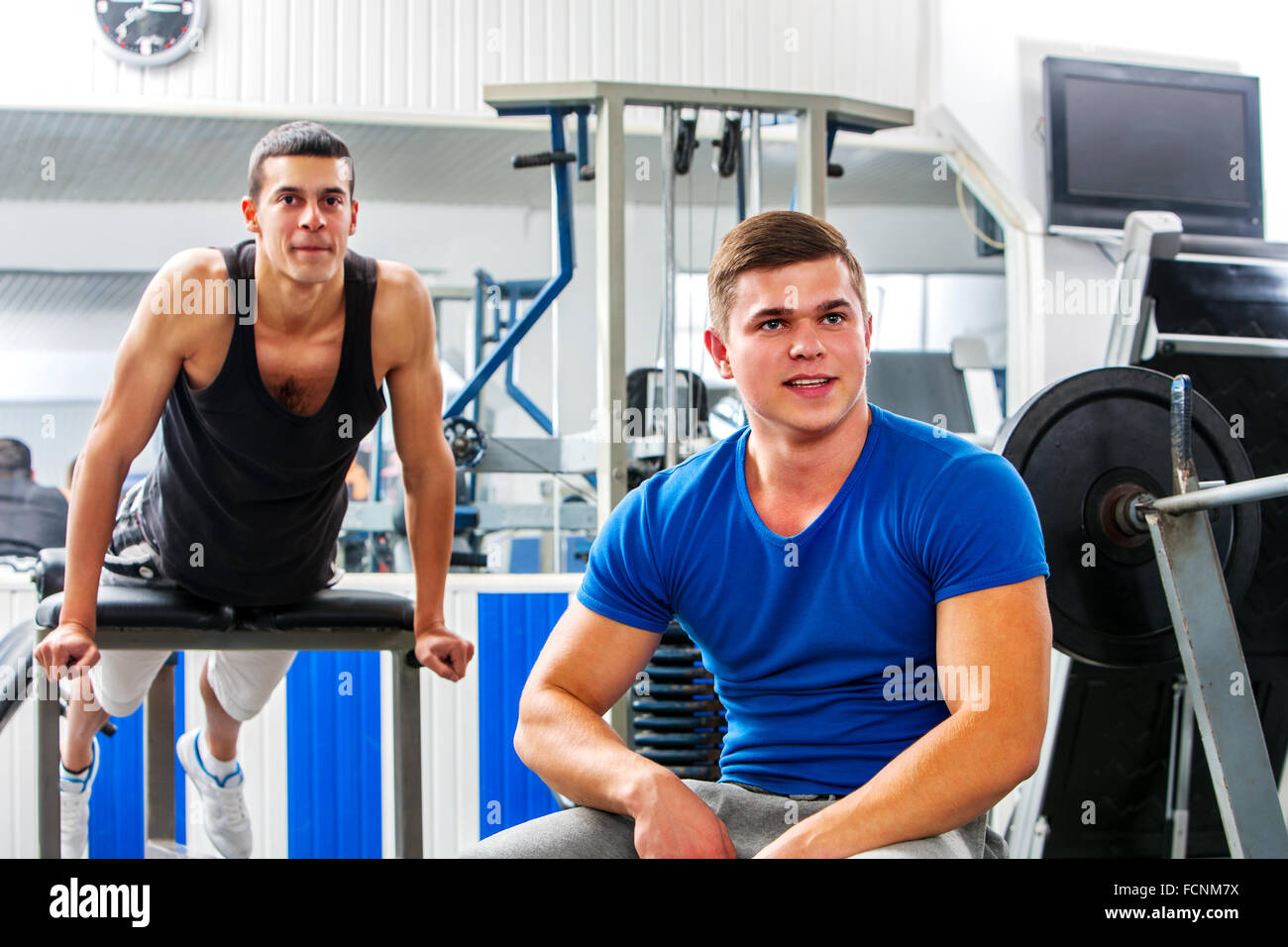 Men working his body at gym Stock Photo - Alamy