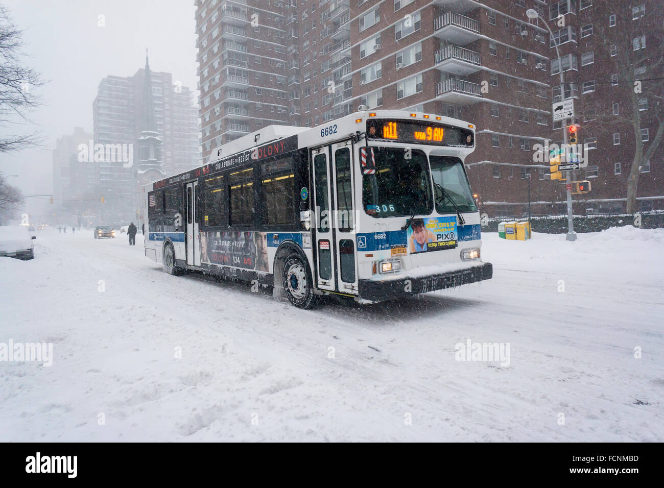 New York, USA. 23rd Jan, 2016. An MTA bus equipped with chains for ...
