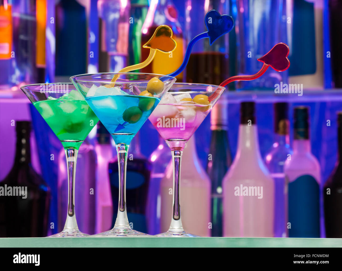 Different cocktail glasses with color drinks Stock Photo - Alamy
