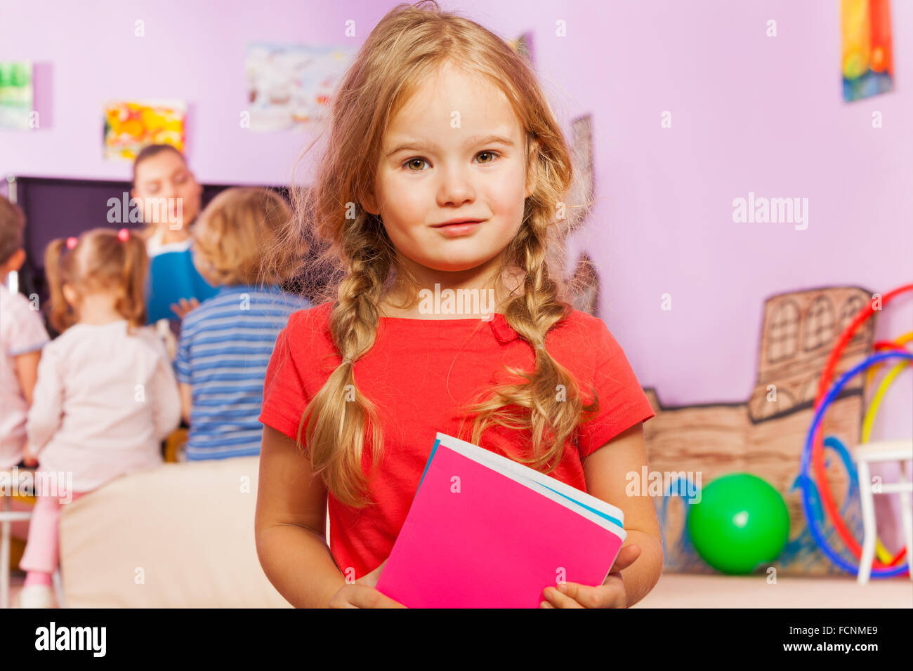 Portrait of little girl in developmental class Stock Photo - Alamy