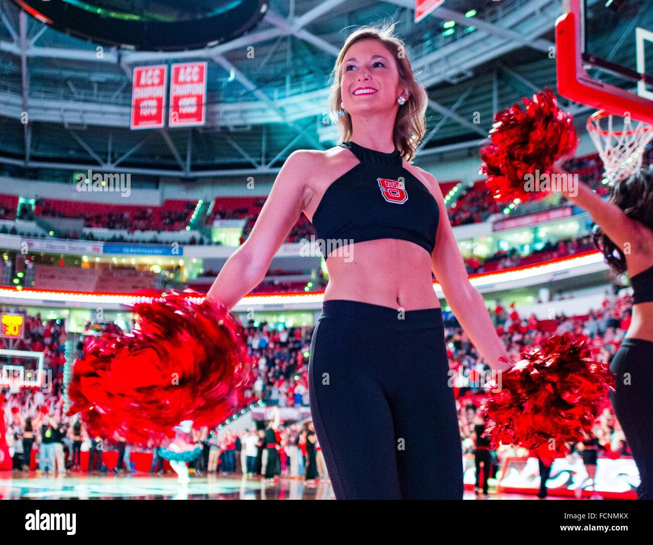 Nc state cheerleader during ncaa hi-res stock photography and images ...