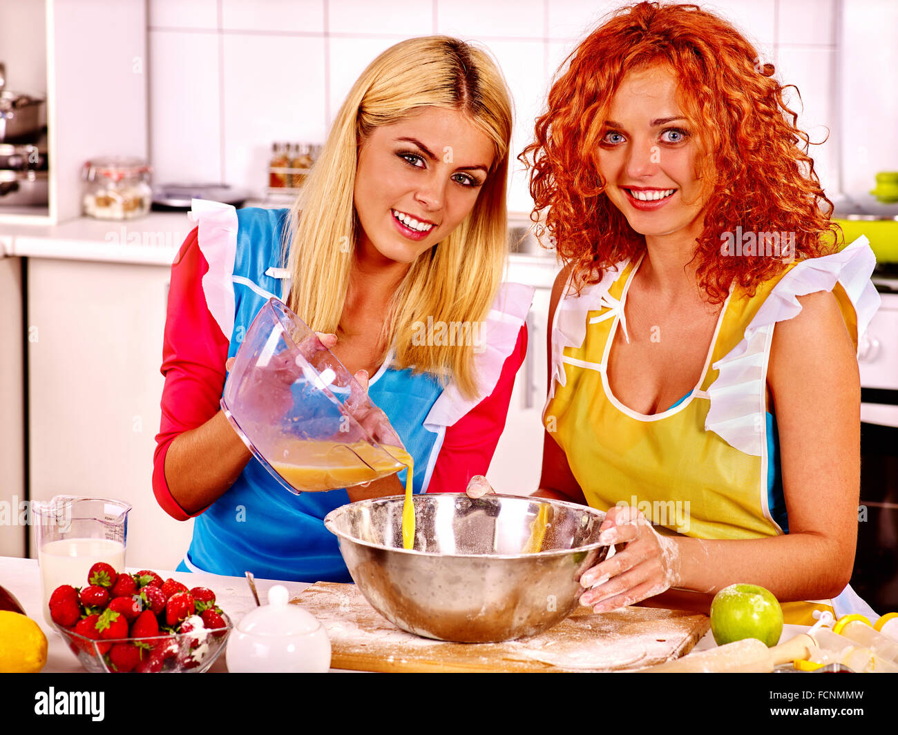 Girl baking cookies in the oven Stock Photo - Alamy