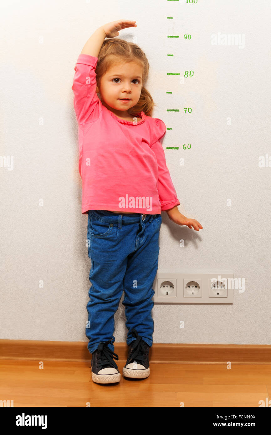 Child growing scale hi-res stock photography and images - Alamy