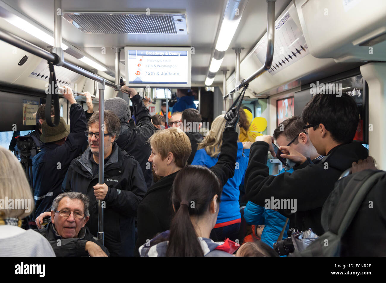 Seattle, USA. 23rd Jan, 2016. Crowd of people riding the inaugural run ...