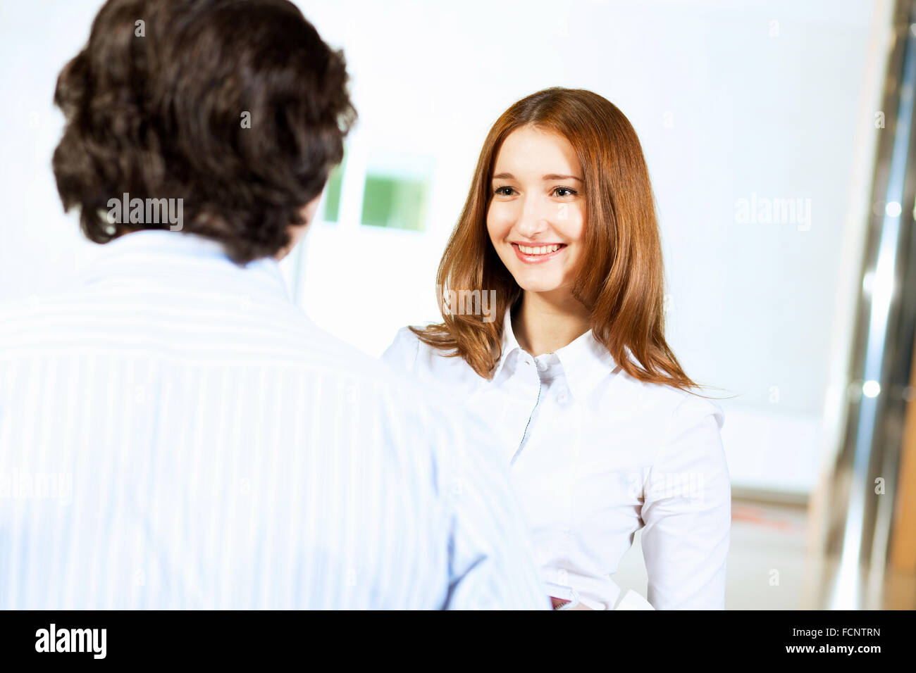 Image of two students discussing their work Stock Photo - Alamy