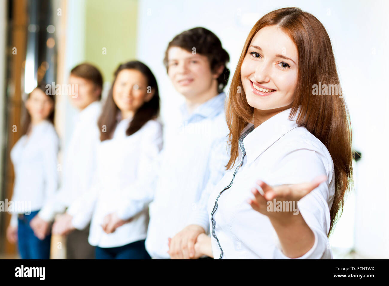 Image of five students in casual wear standing in row Stock Photo - Alamy