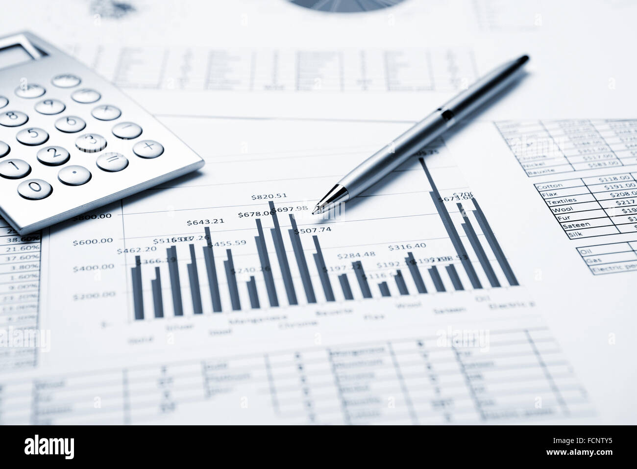 financial charts and graphs on the table Stock Photo - Alamy