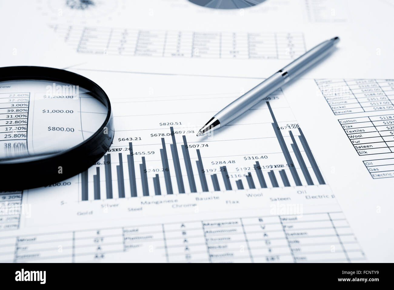 financial charts and graphs on the table Stock Photo - Alamy