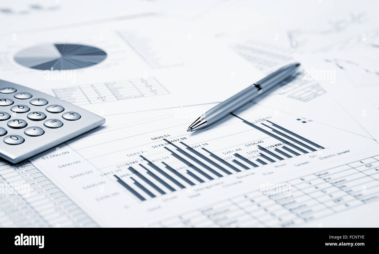 financial charts and graphs on the table Stock Photo - Alamy