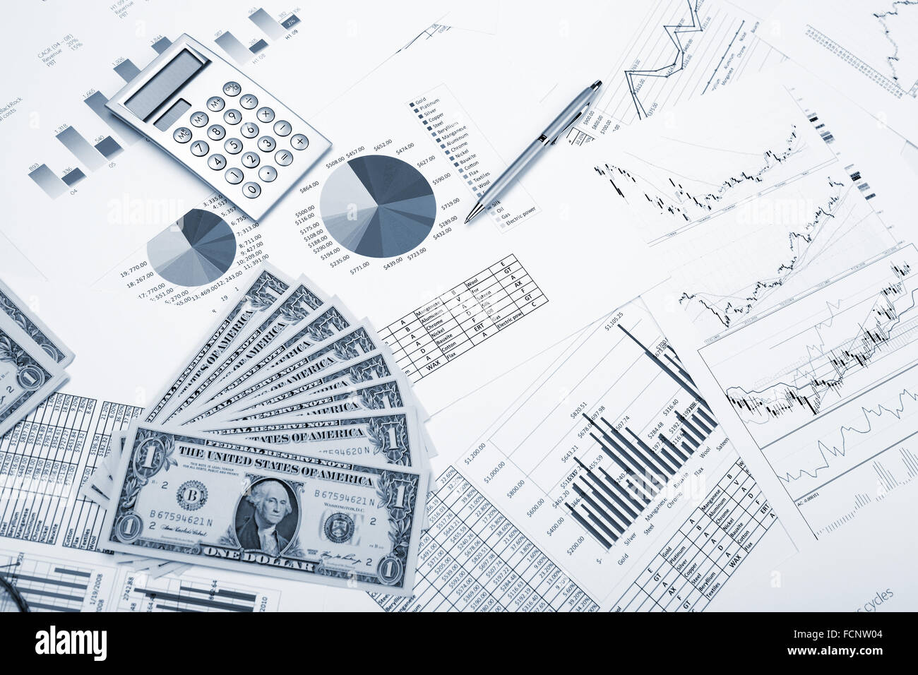 financial charts and graphs on the table Stock Photo - Alamy