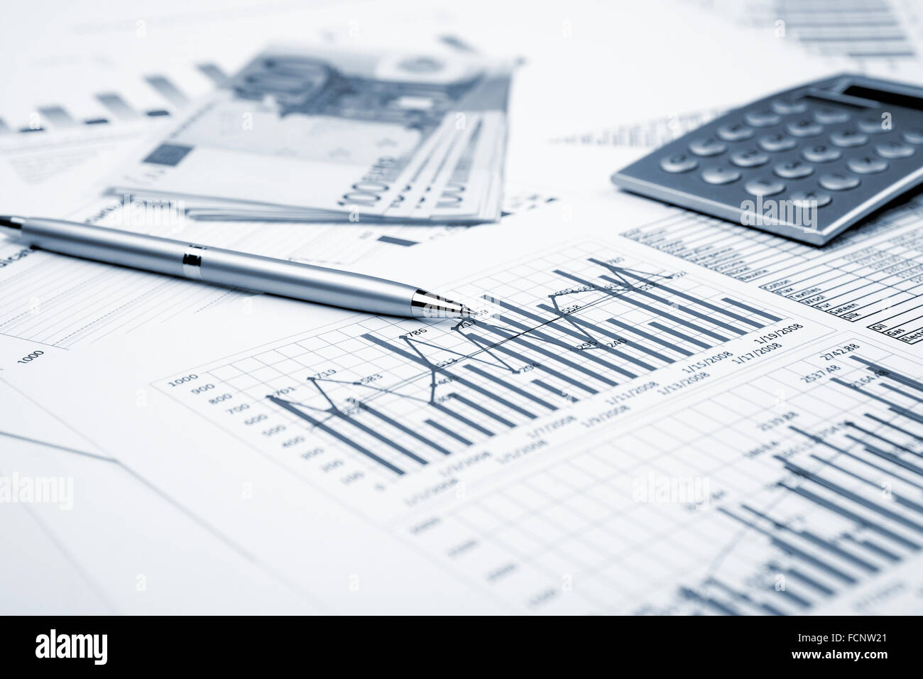 financial charts and graphs on the table Stock Photo - Alamy