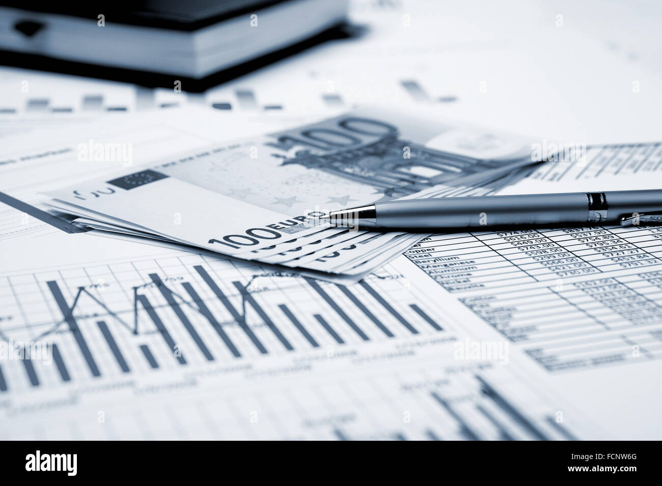 financial charts and graphs on the table Stock Photo - Alamy