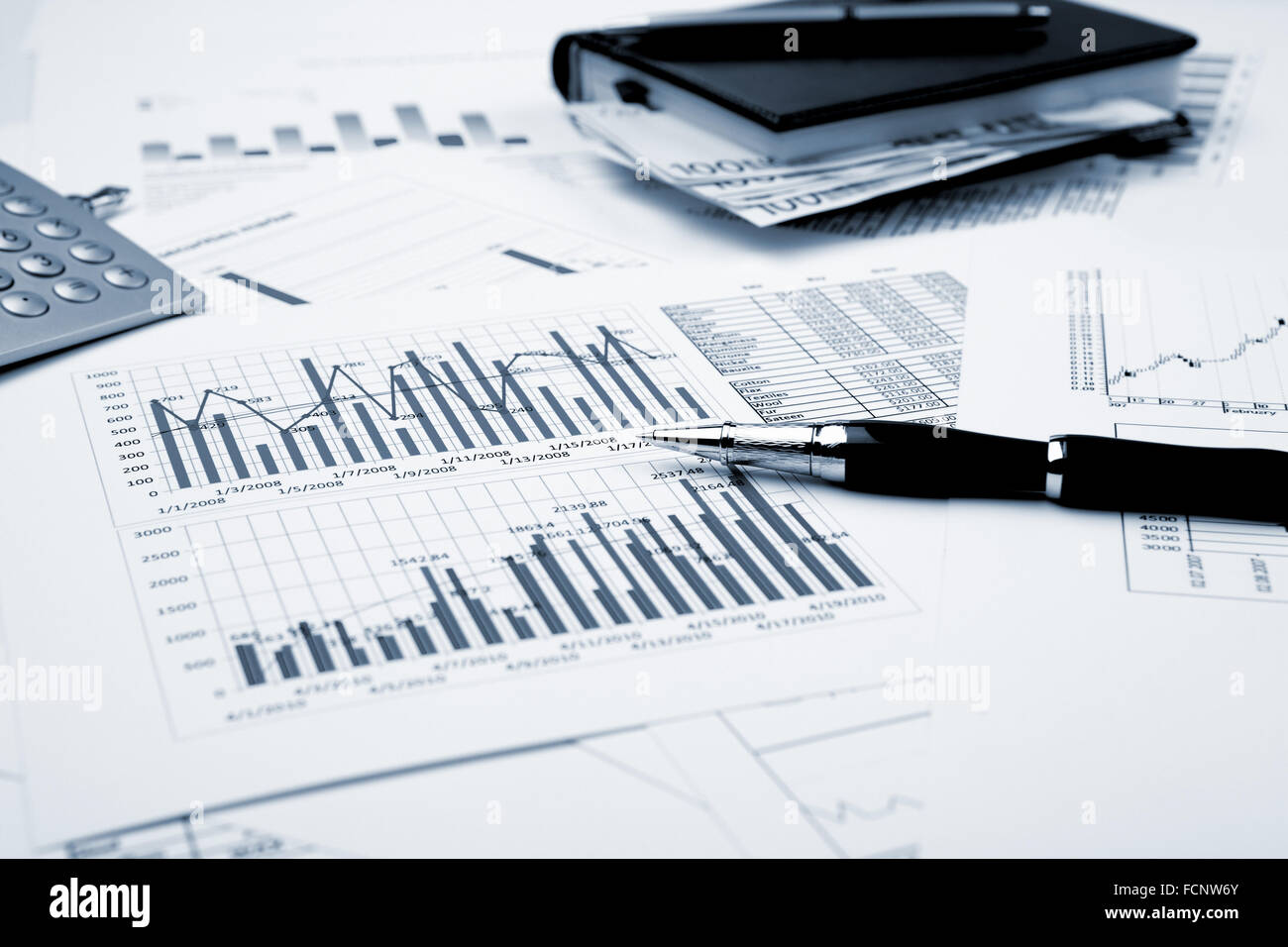 financial charts and graphs on the table Stock Photo - Alamy