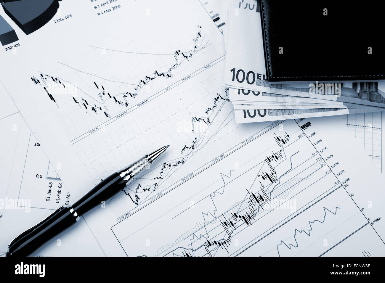 financial charts and graphs on the table Stock Photo - Alamy