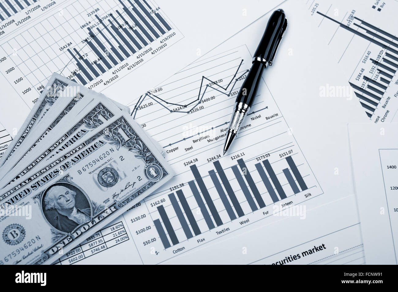 financial charts and graphs on the table Stock Photo - Alamy