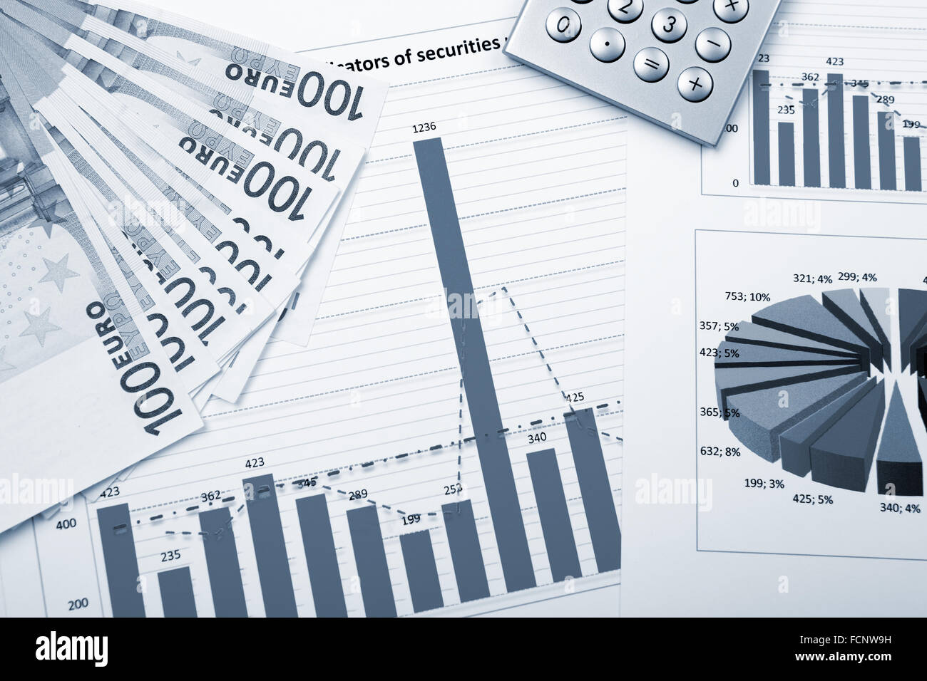 financial charts and graphs on the table Stock Photo - Alamy