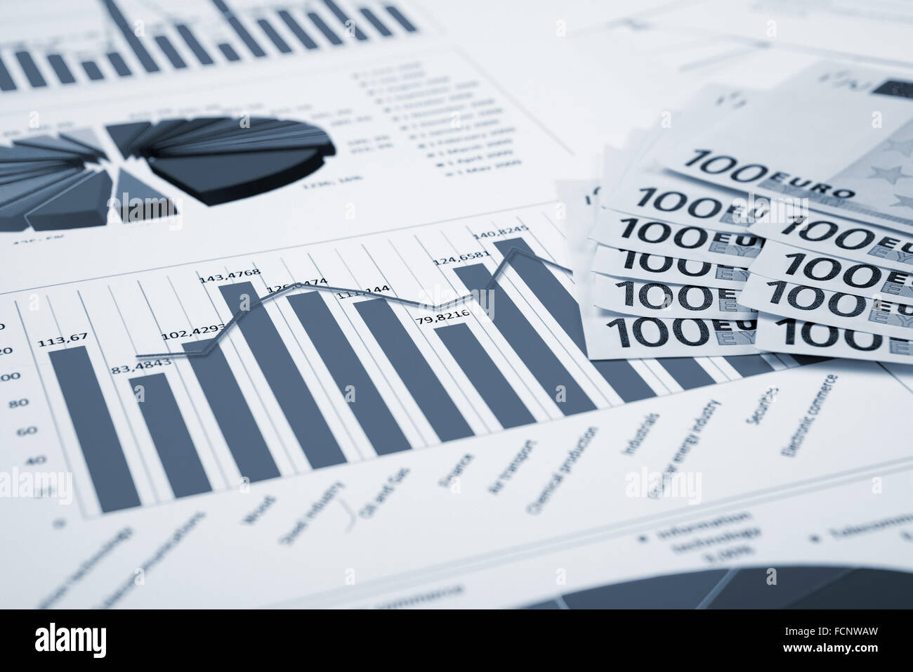 financial charts and graphs on the table Stock Photo - Alamy