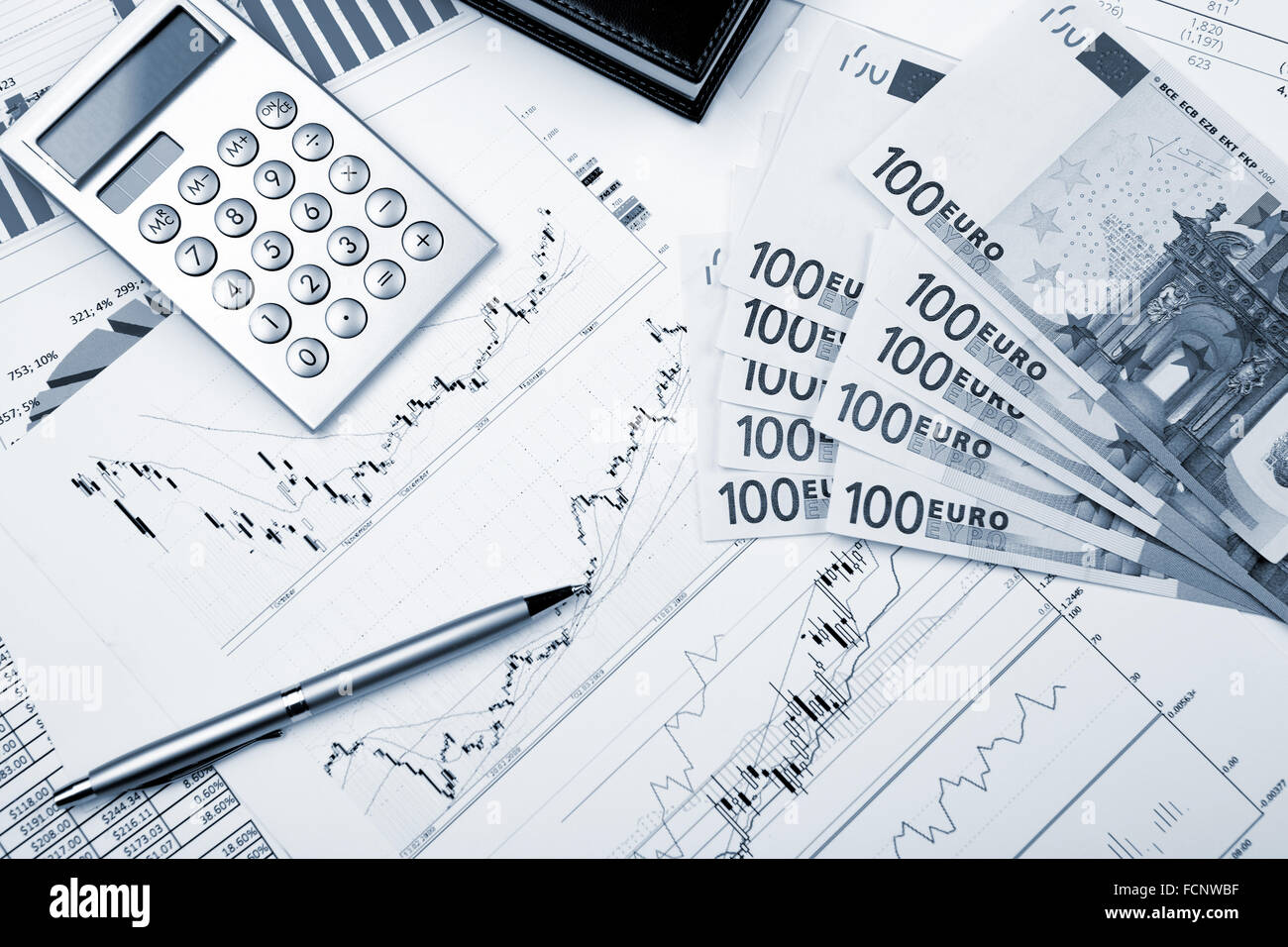 financial charts and graphs on the table Stock Photo - Alamy