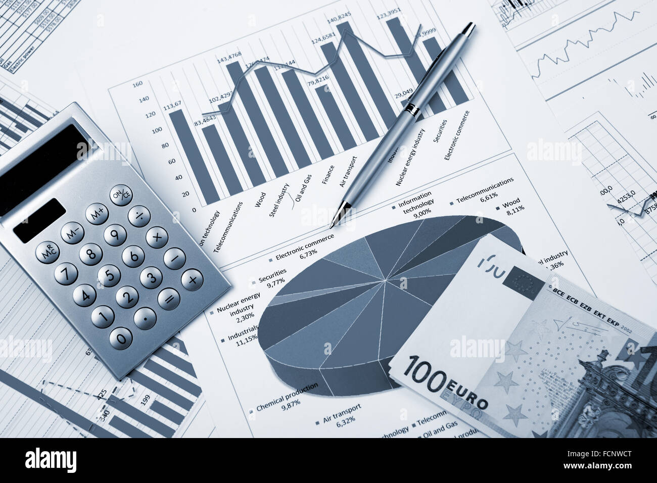 financial charts and graphs on the table Stock Photo - Alamy