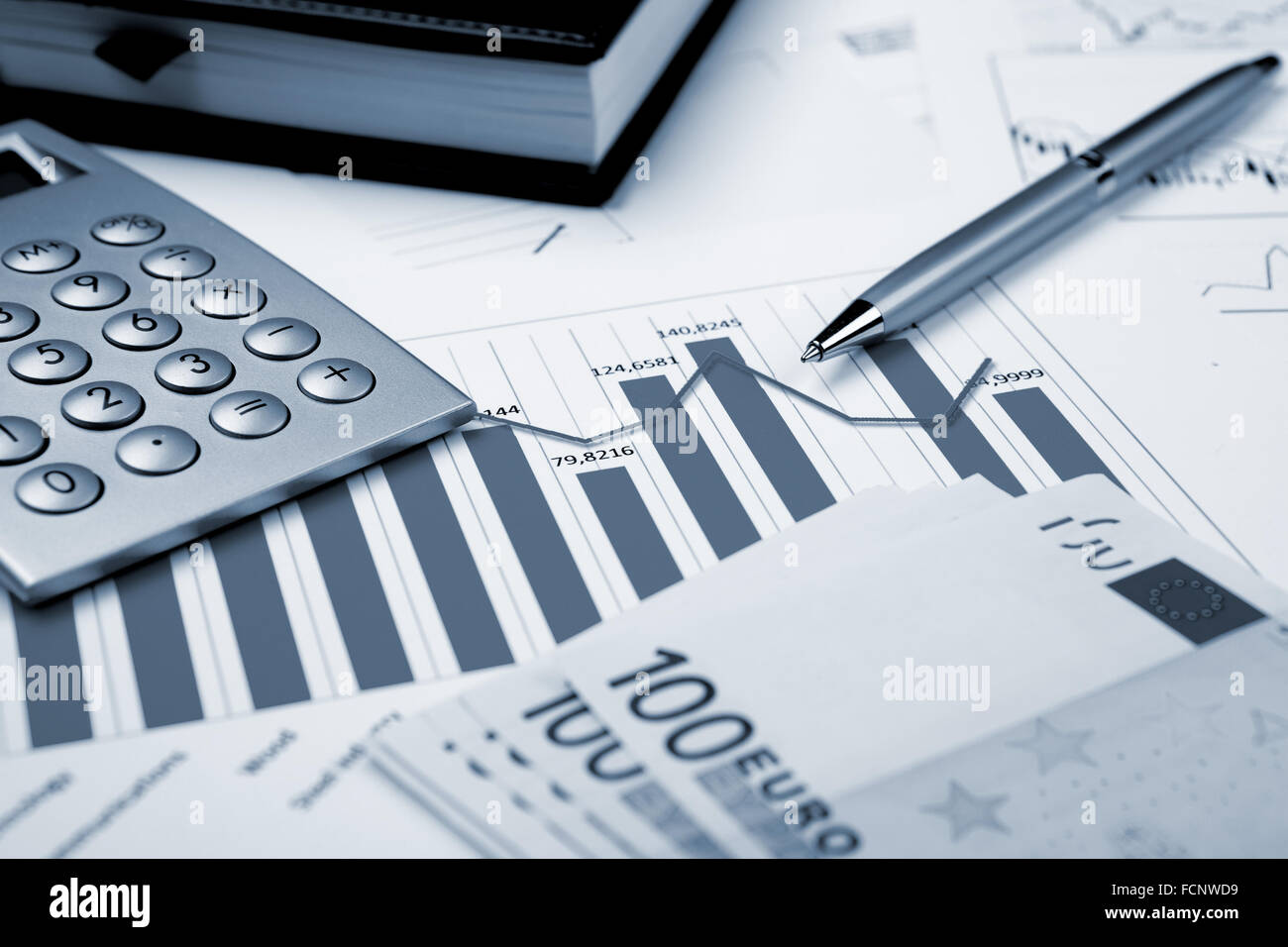 financial charts and graphs on the table Stock Photo - Alamy
