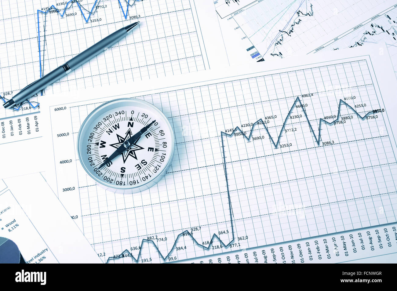 Graphs and charts. Workplace businessman Stock Photo - Alamy