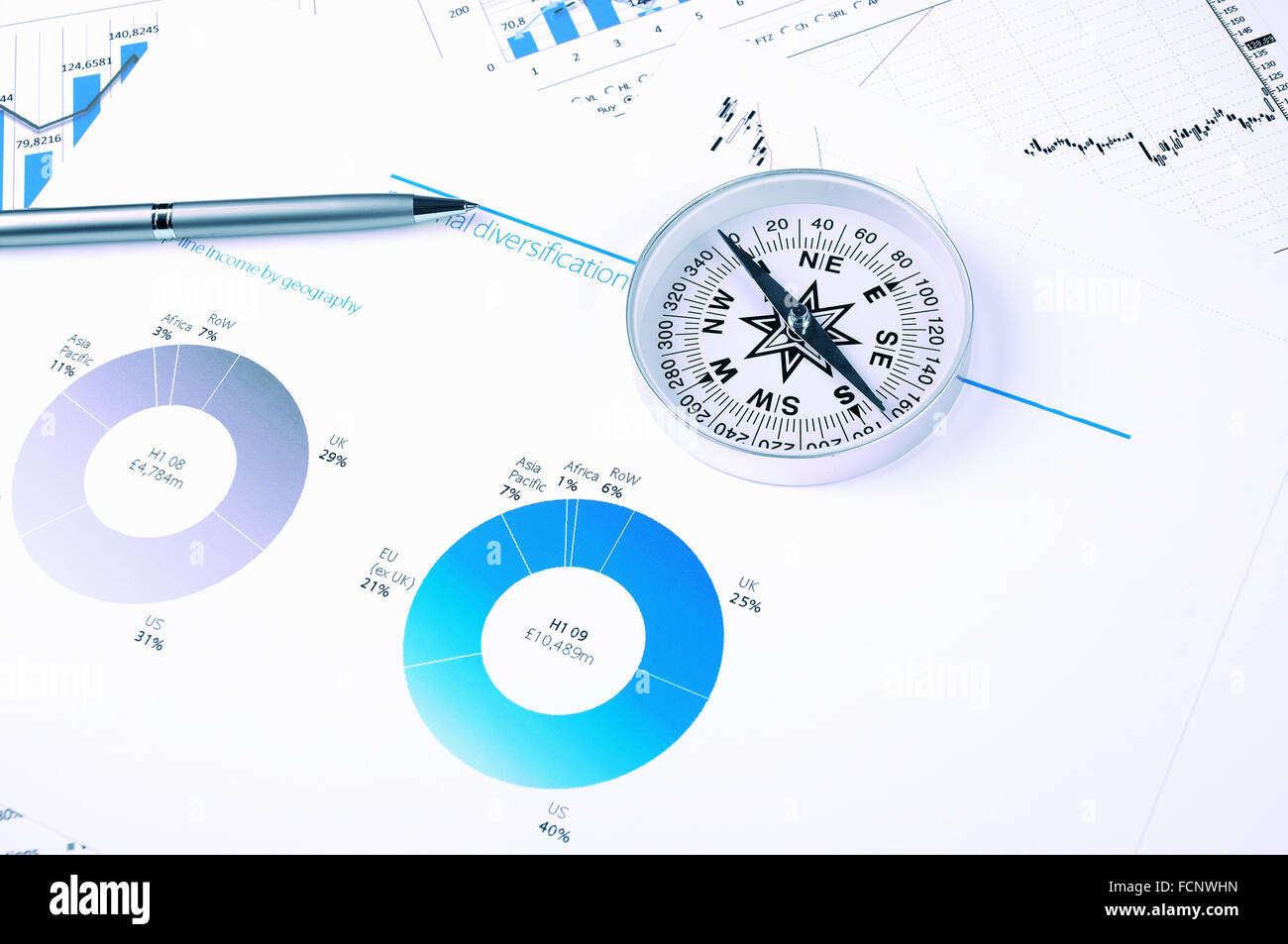 Graphs and charts. Workplace businessman Stock Photo - Alamy