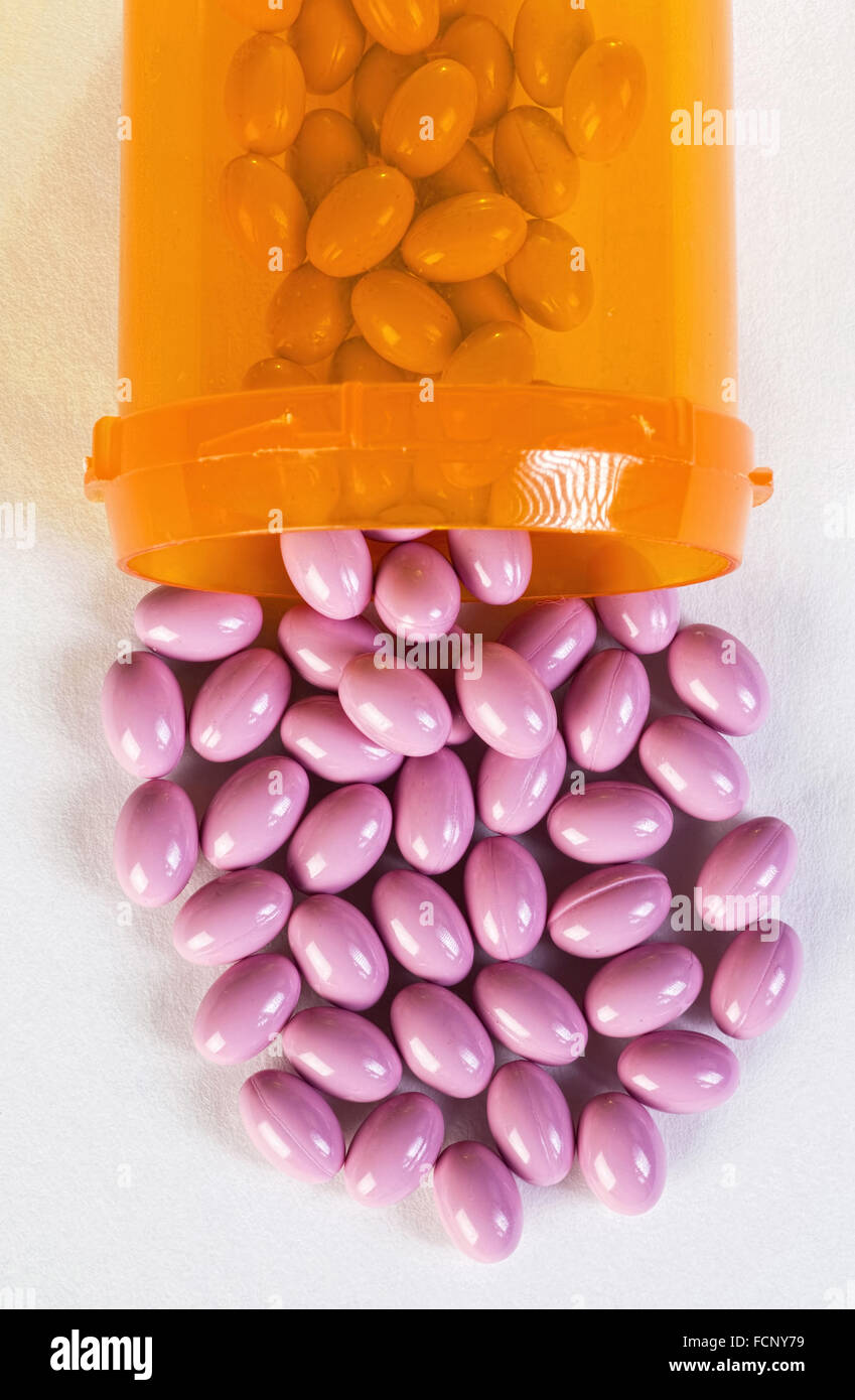 Pretty little pink pills Stock Photo - Alamy