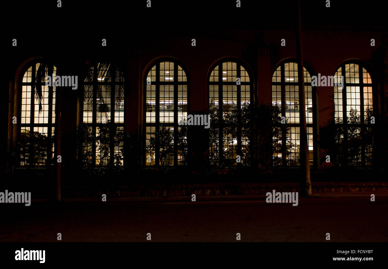 Library windows at night Stock Photo - Alamy