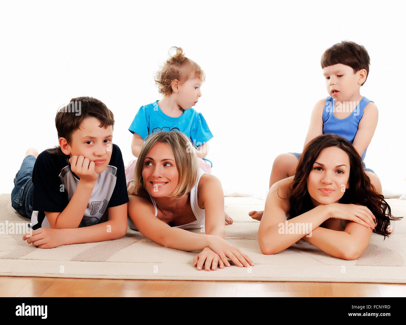 Children and parents have fun together Stock Photo - Alamy