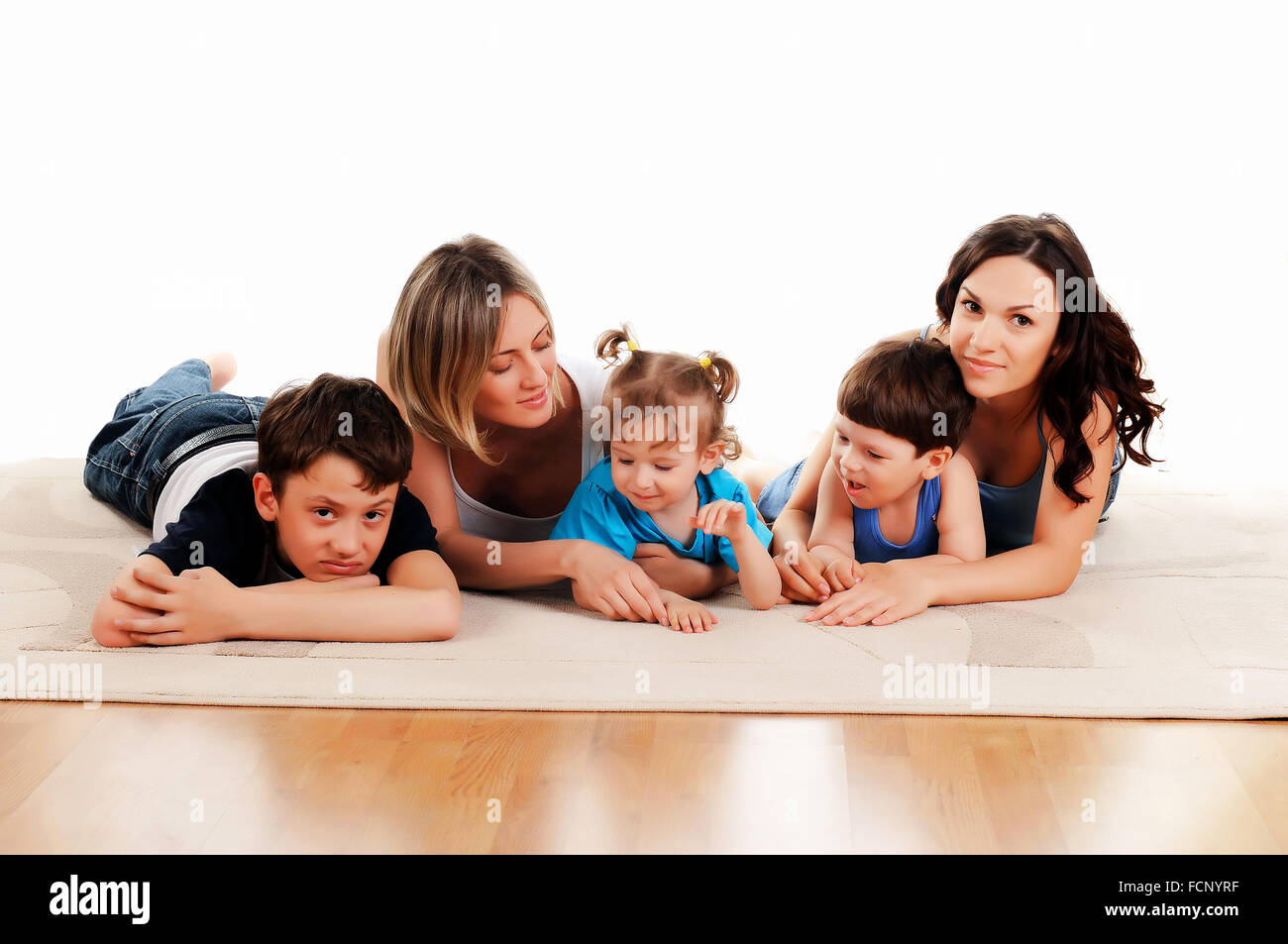 Children and parents have fun together Stock Photo - Alamy