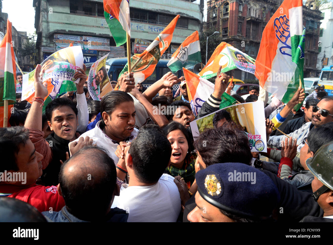 Kolkata, India. 23rd Jan, 2016. Peopleg holding flags during protest in ...