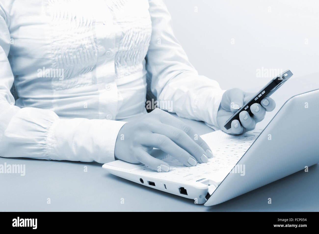 Hands of a young girl running on a computer in the office Stock Photo ...