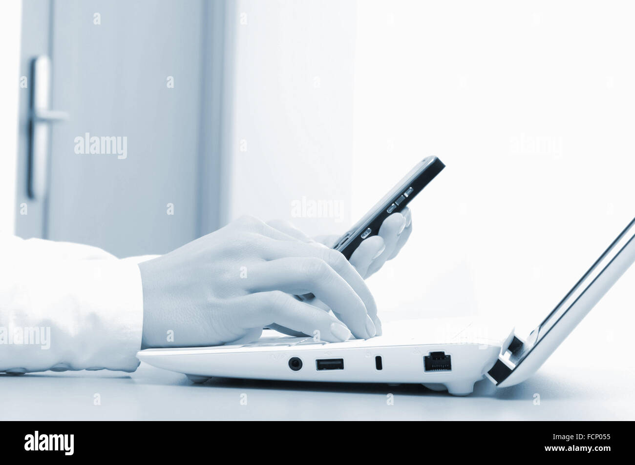 Hands of a young girl running on a computer in the office Stock Photo ...