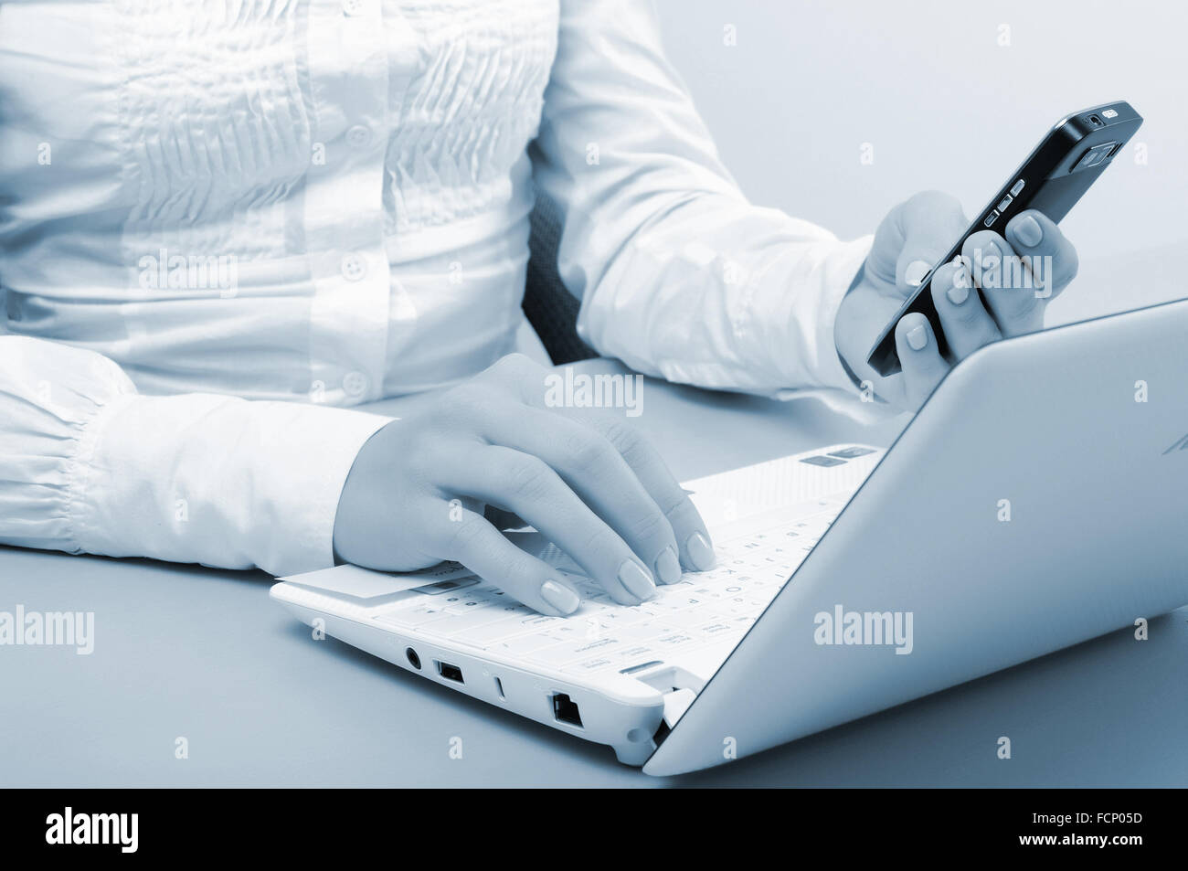 Hands of a young girl running on a computer in the office Stock Photo ...