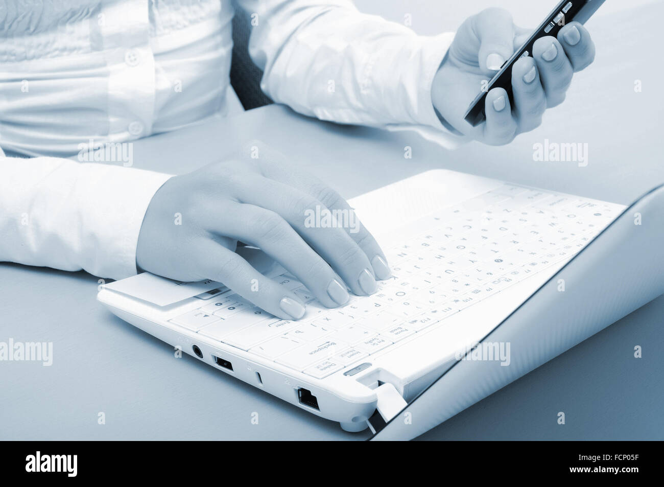 Hands of a young girl running on a computer in the office Stock Photo ...