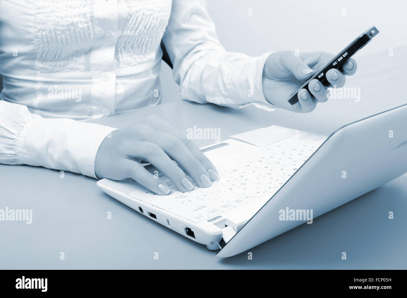 Hands of a young girl running on a computer in the office Stock Photo ...