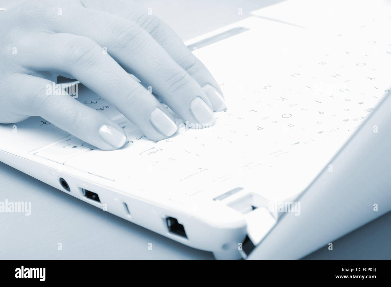 Hands of a young girl running on a computer in the office Stock Photo ...