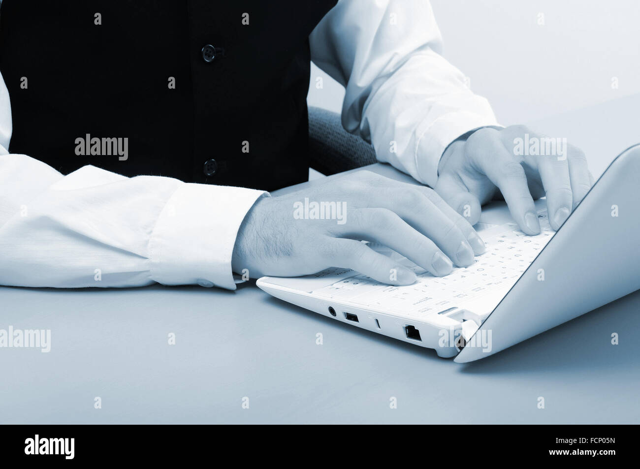 Hands of a young girl running on a computer in the office Stock Photo ...
