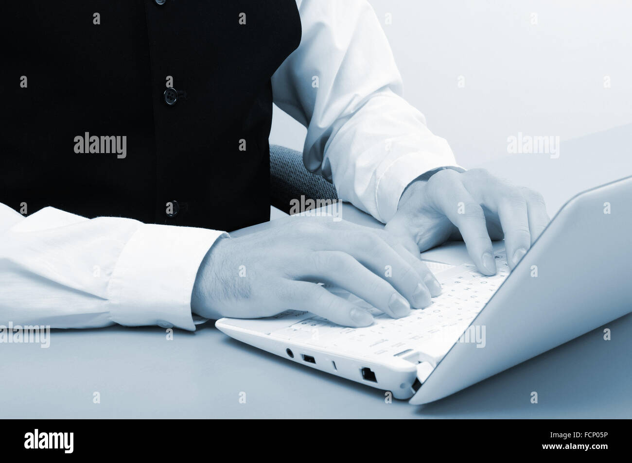 Hands of a young girl running on a computer in the office Stock Photo ...