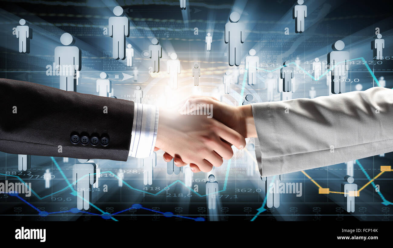 Close up of business handshake on digital background Stock Photo - Alamy