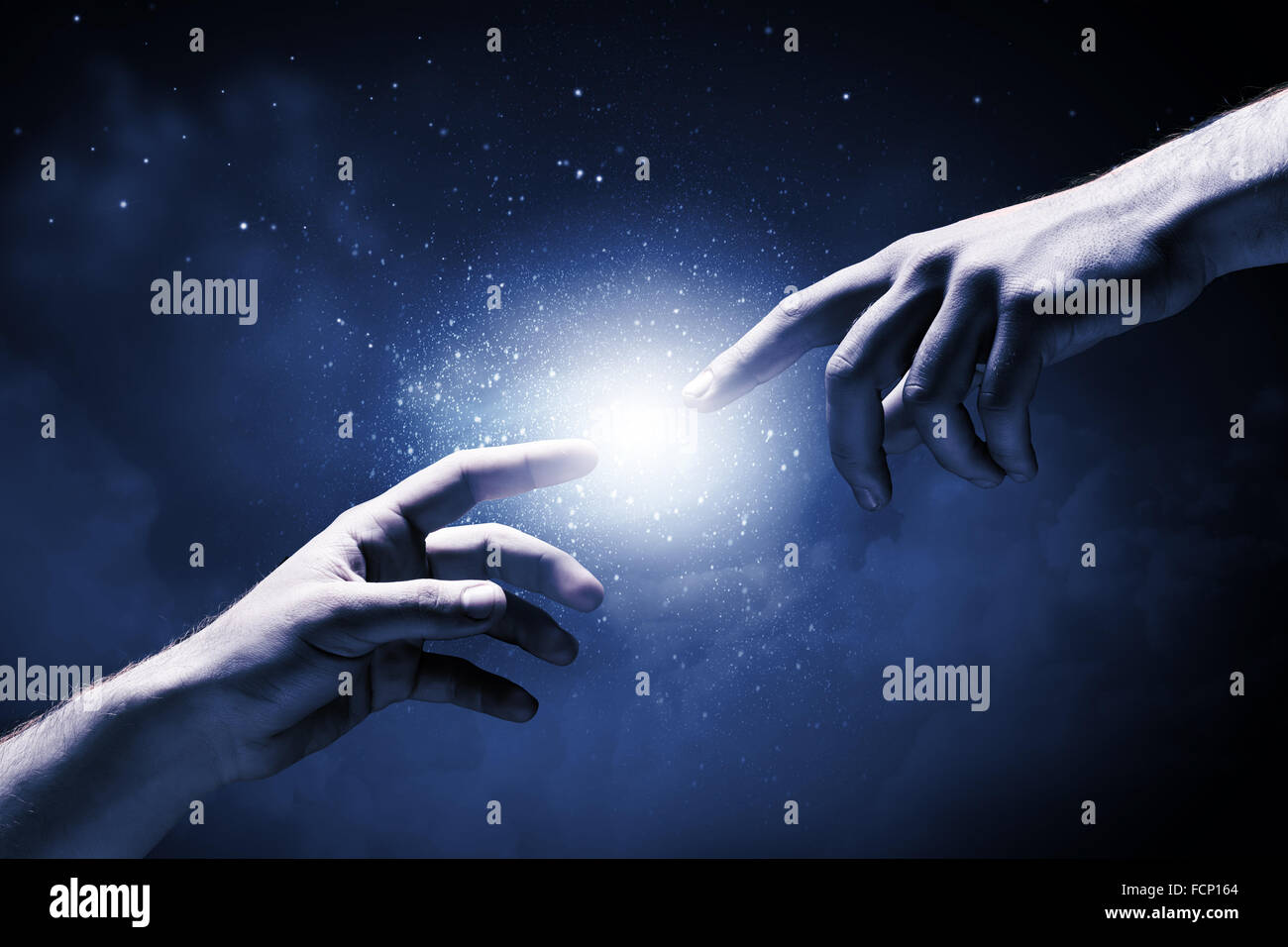 Close up of two hands reaching each other with fingers Stock Photo - Alamy