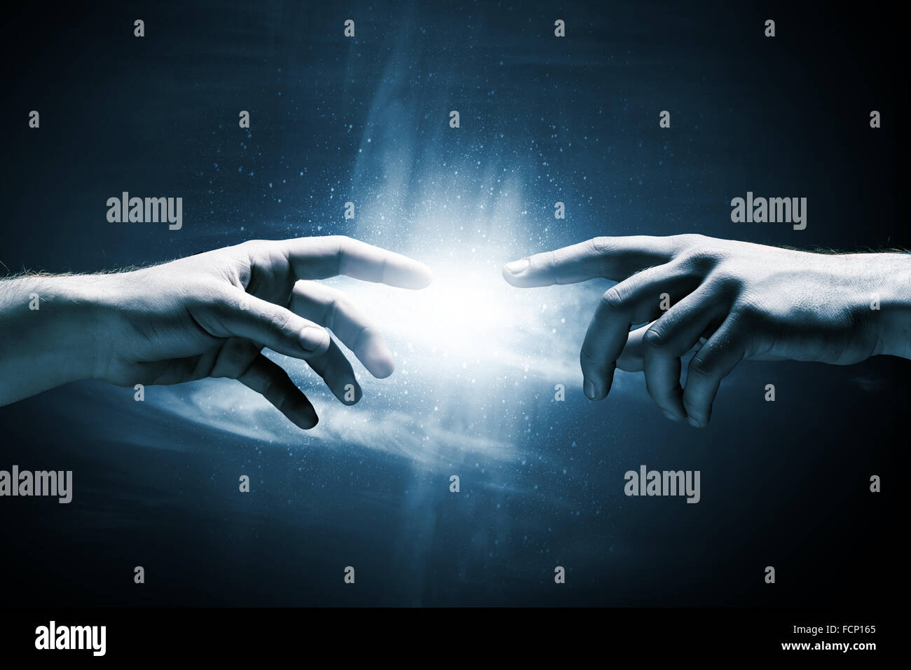 Close up of two hands reaching each other with fingers Stock Photo - Alamy
