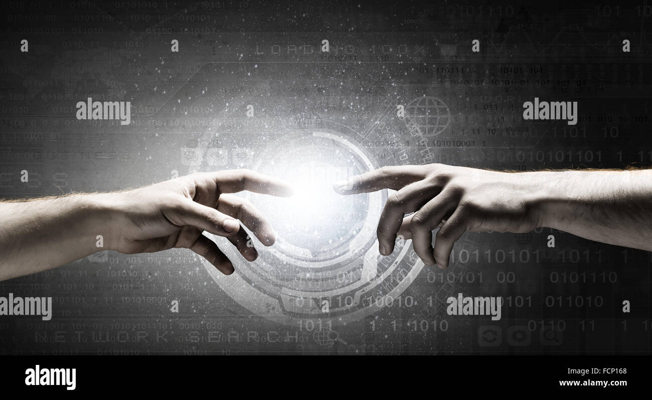 Close up of two hands reaching each other with fingers Stock Photo - Alamy