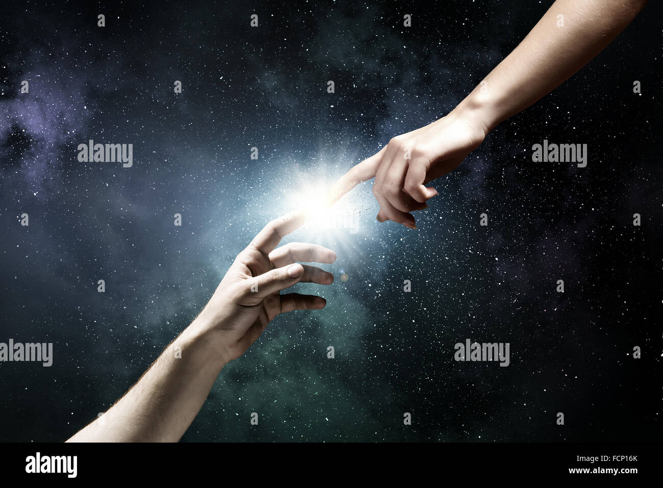 Close up of two hands reaching each other with fingers Stock Photo - Alamy