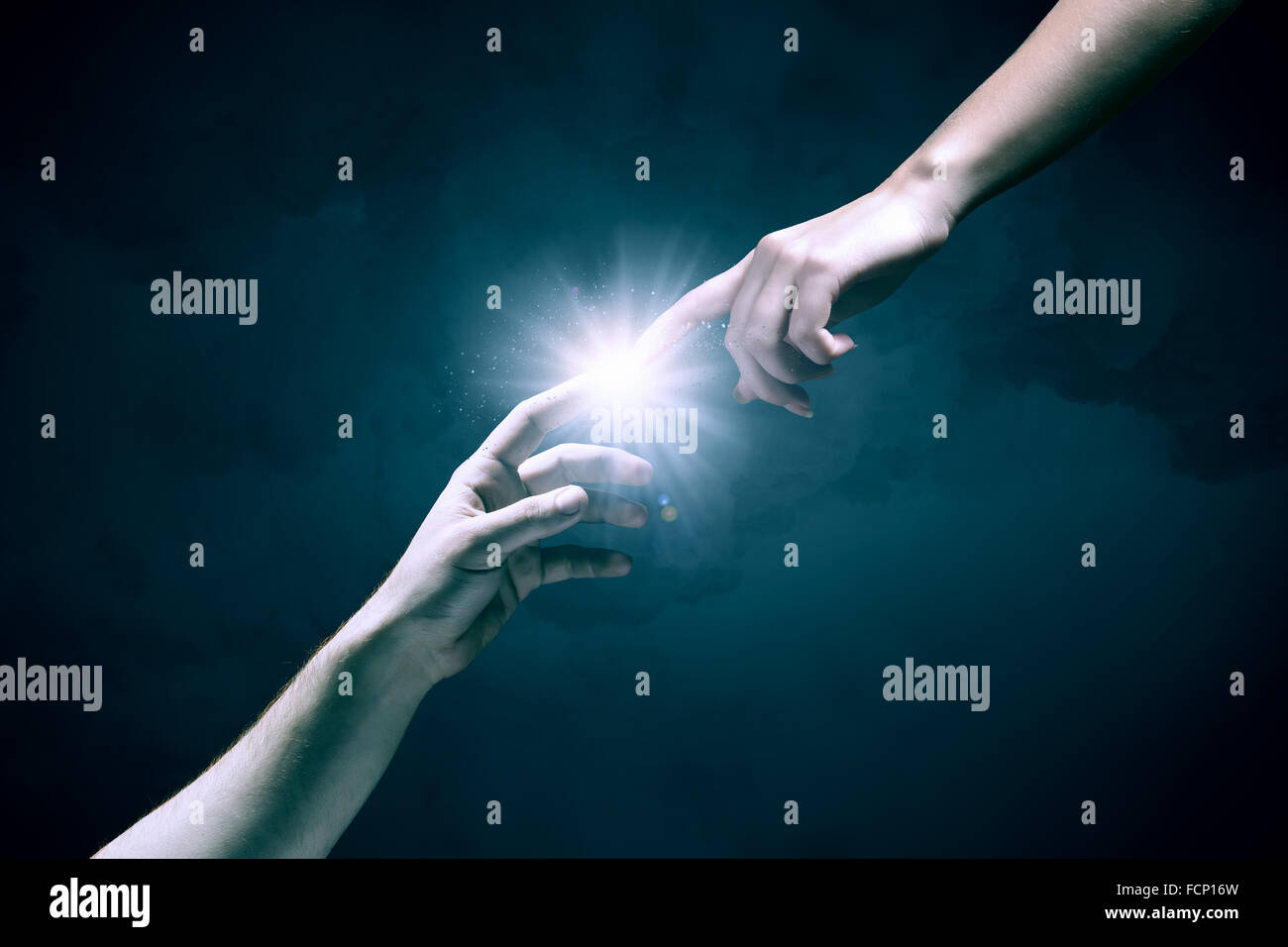 Close up of two hands reaching each other with fingers Stock Photo - Alamy