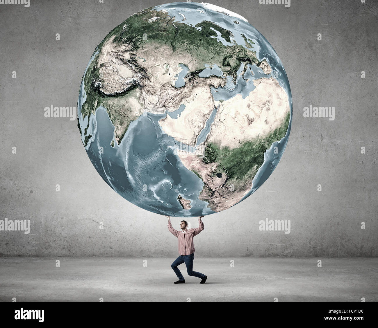 Young man lifting Earth planet above head. Elements of this image are ...