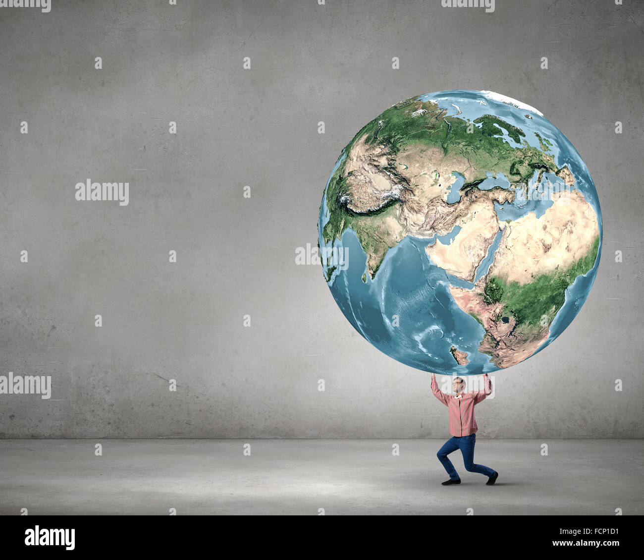 Young man lifting Earth planet above head. Elements of this image are ...