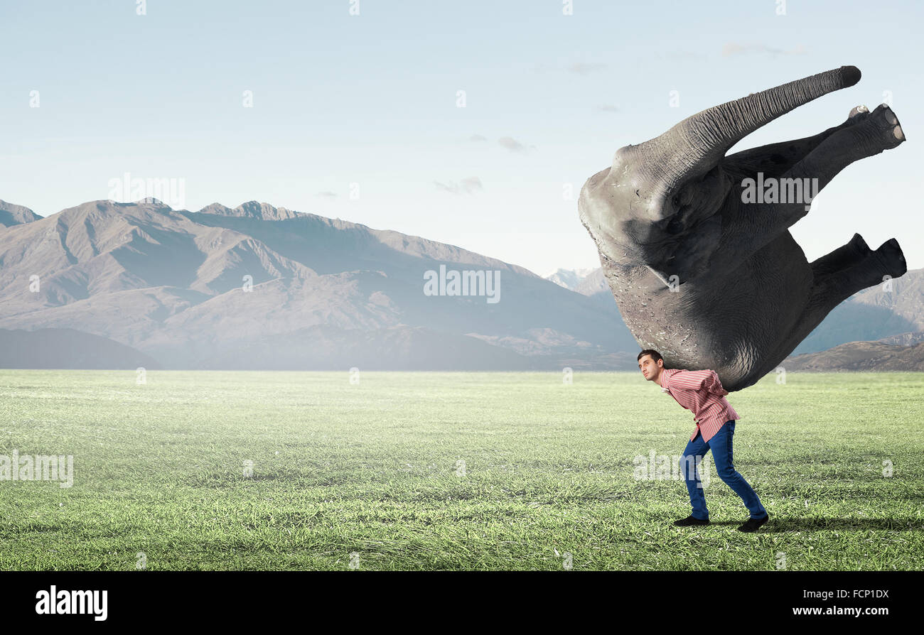 Lifting carrying heavy load hi-res stock photography and images - Alamy