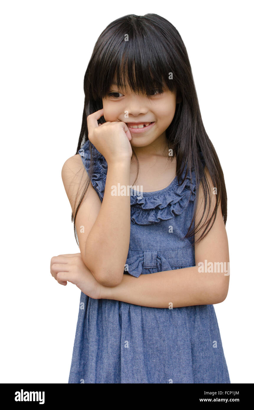 Asian girl standing thinking Stock Photo - Alamy
